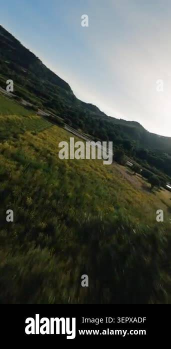 Aerial shot of dry hills and sparse trees Stock Video Footage - Alamy