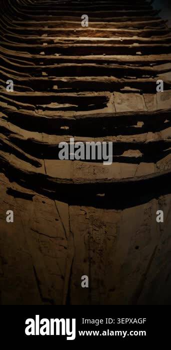 Narrow view inside wooden shipwreck with layered planks Stock Video ...
