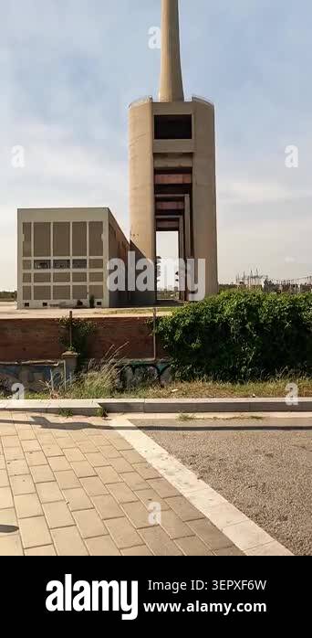 Historic concrete towers of the Tres Chimeneas thermal power station in ...