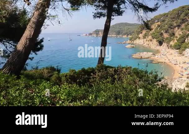 Lloret de Mar, Spain - June 7, 2026 - Crowd enjoys water at Sa Boadella ...