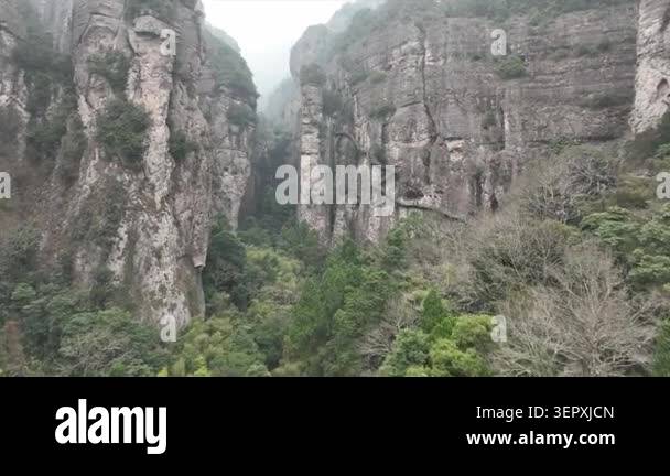 Drone view revealing impressive height and deep canyon formations of ...