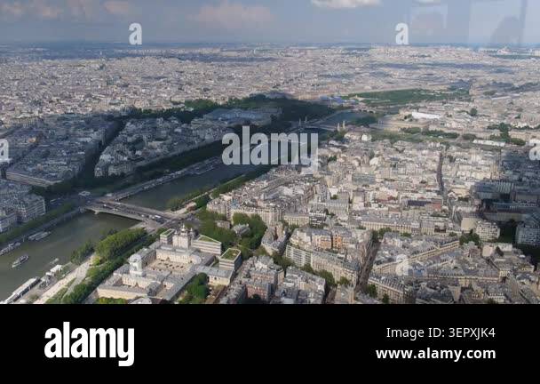 Aerial view of Paris, France, showing the Seine River and dense urban ...