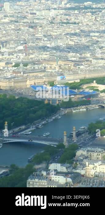 Vertical video showing aerial view of Paris cityscape with the Seine ...