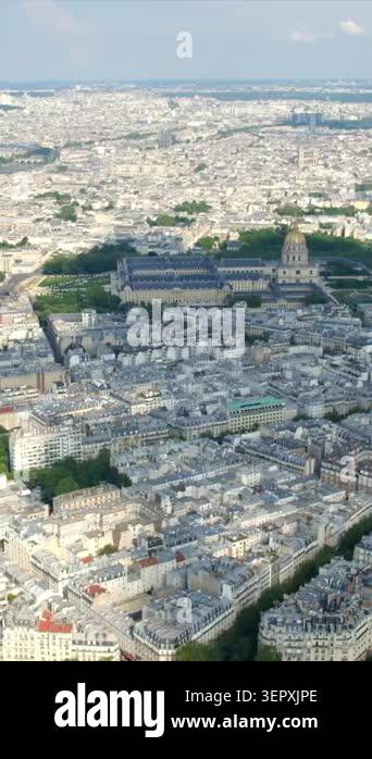 Vertical video showing aerial view of Paris cityscape with the golden ...