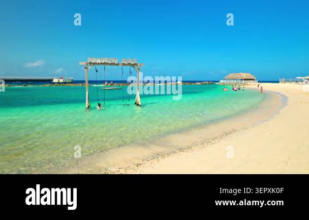 Beautiful view of Mangrove Beach lagoon with people relaxing in ...