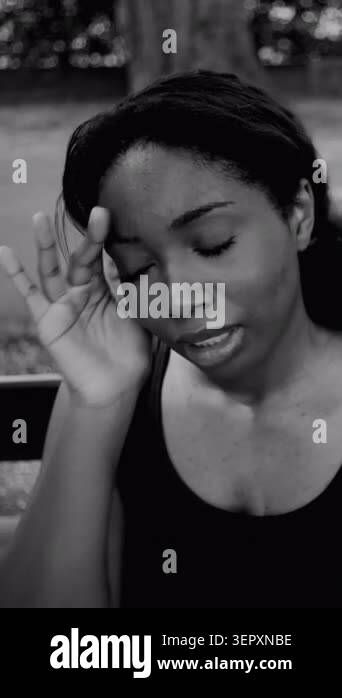 Young African American Woman navigating a difficult emotional moment in ...