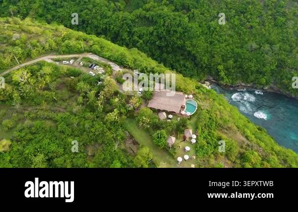 Aerial view of amok sunset restaurant and bar perched on a cliffside. A ...