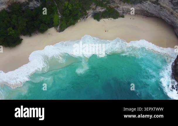 Amazing aerial top view of kelingking beach, a secluded white sand ...