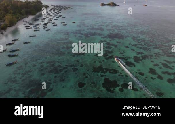 Aerial view of boat navigating clear water Stock Video Footage - Alamy
