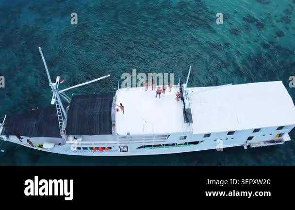 Aerial top down view of a traditional indonesian phinisi boat sailing ...