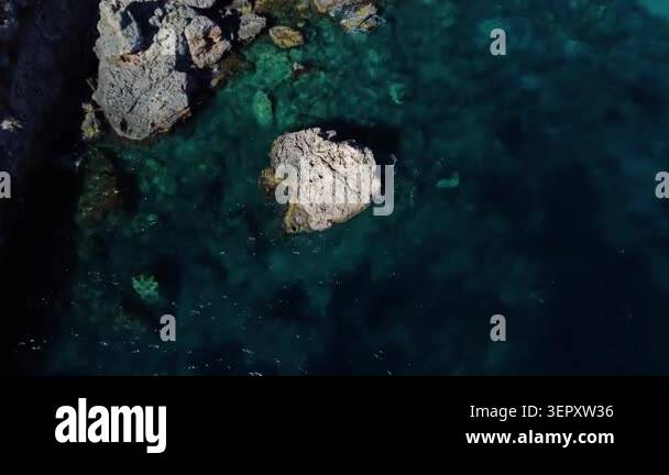 Aerial top down view of the stunning rocky coastline of hvar island ...