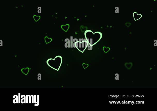 Abstract green hearts flying and sparkling on a black background ...