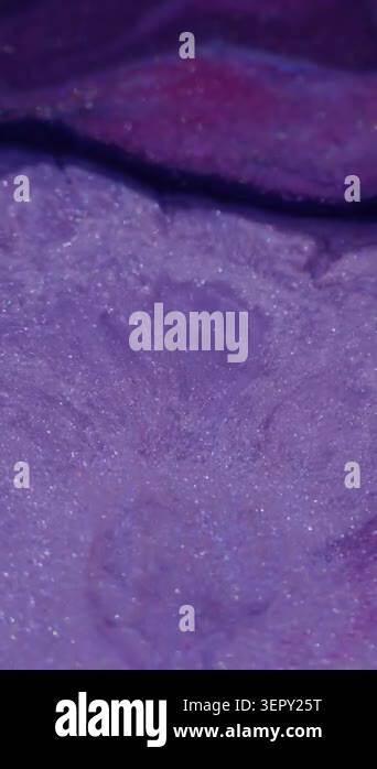 Vertical video. Paint splash. Color background. Defocused purple blue ...