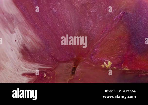 Shimmering fluid. Ink water. Defocused purple golden yellow color shiny ...