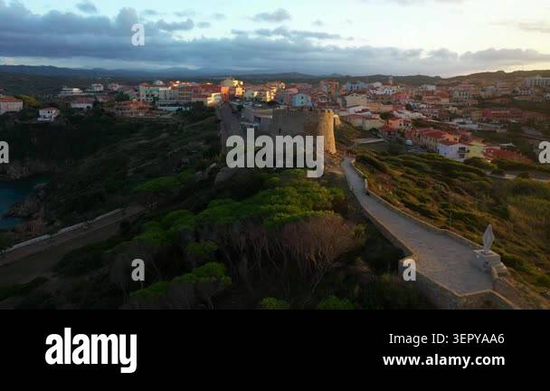 Mediaeval Tower In Front Of Beautiful Ancient Houses On Rocky Cape On A ...