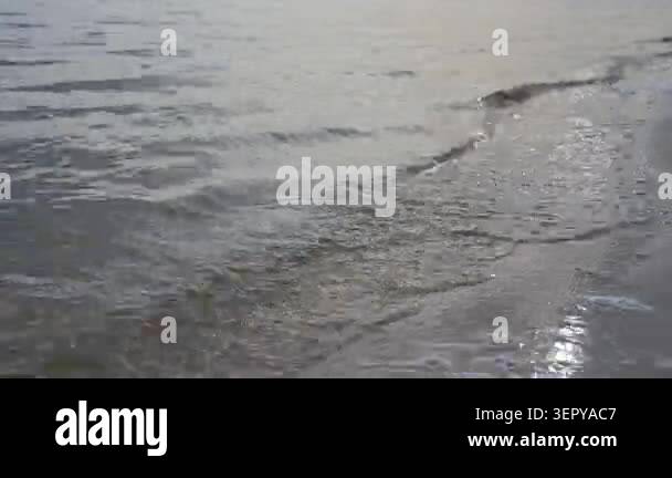 Static 4K video of a sandy beach coastline in real time with selective ...