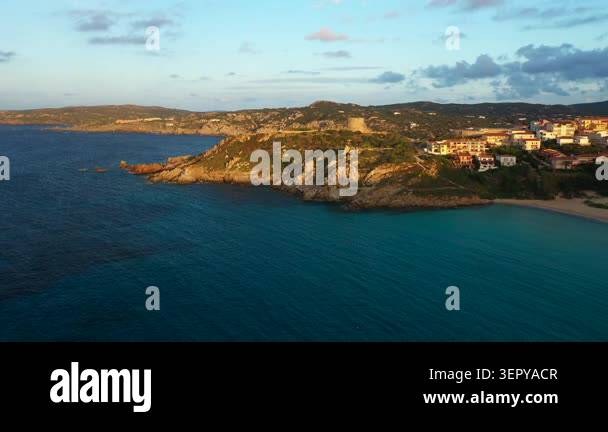 A flight along a picturesque rocky sea cape with an ancient fortress ...