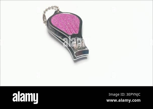 Macro shot of a cute pink hot air balloon shaped mini nail cutter ...