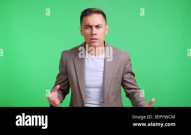 Handsome man in a suit sending air kisses and expressing romantic ...