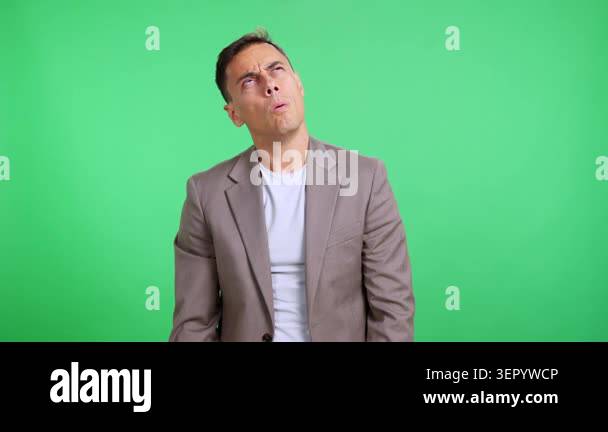 Confused businessman scratching his head and thinking hard against a ...