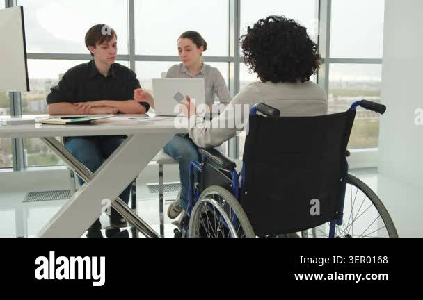 Teamwork brainstorm. Diverse multiracial colleagues woman in chair for ...
