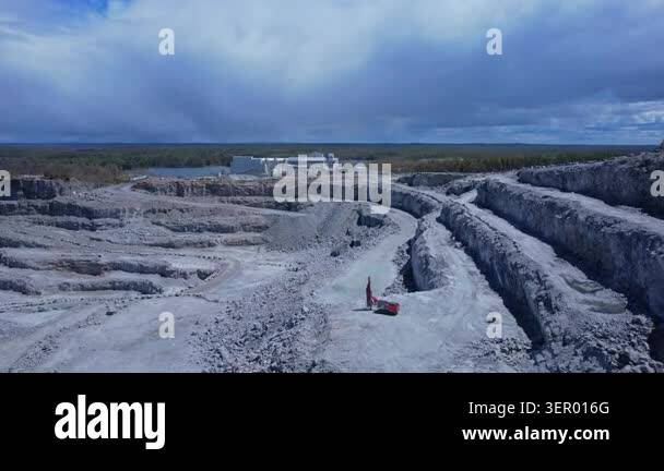 Industrial open pit mining site with quarry at mountain. Aerial view of ...