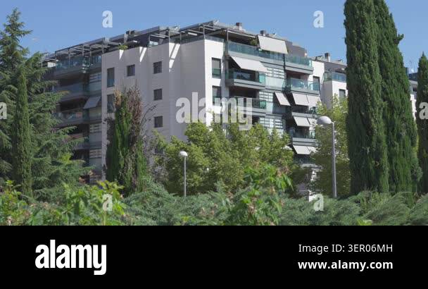 Contemporary residential apartment building with balconies and ...