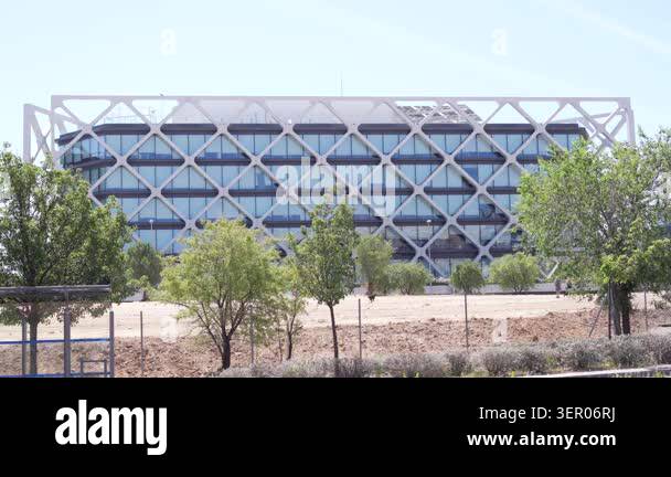Contemporary office building featuring a distinctive geometric lattice ...