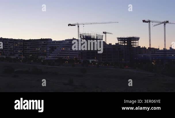 Tower cranes rise above residential developments under construction ...