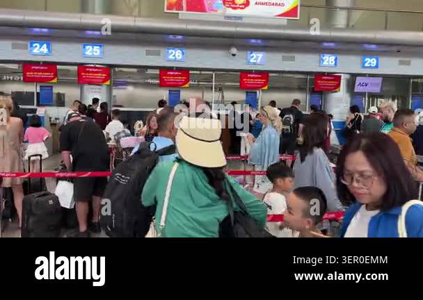 Authentic airport scene featuring travelers, terminal activity and a ...