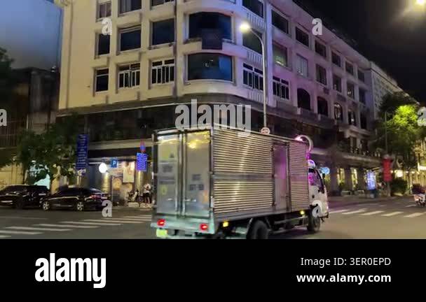 A collection of evening scenes from Ho Chi Minh City featuring ...