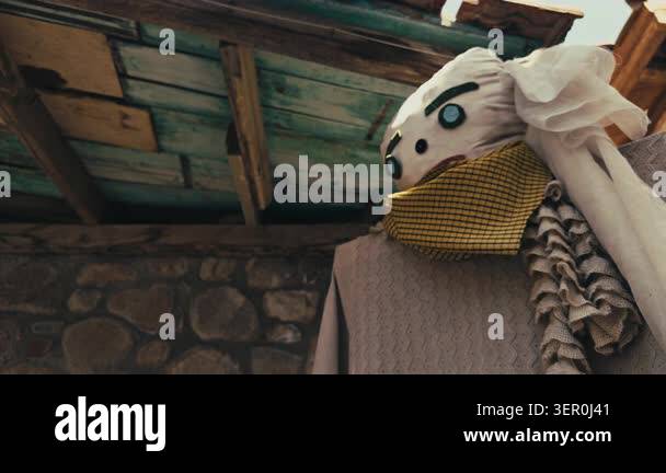 High resolution cinematic shot of a unique handmade cloth puppet in ...
