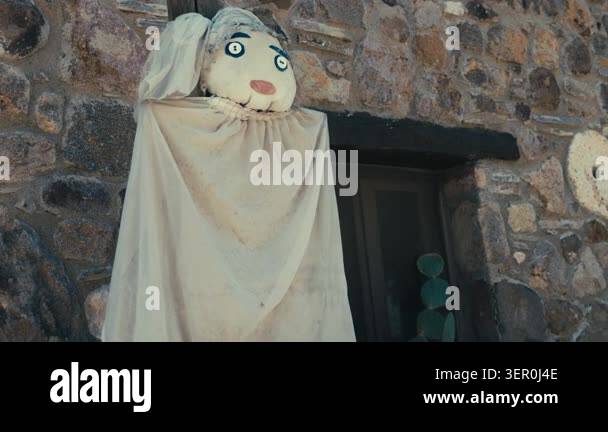 High resolution cinematic shot of a unique handmade cloth puppet in ...