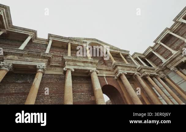 Majestic low angle shot of the ancient Roman Gymnasium ruins at the ...
