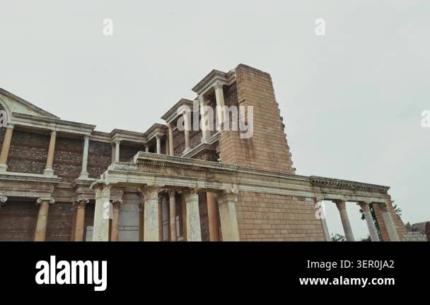 Majestic low angle shot of the ancient Roman Gymnasium ruins at the ...