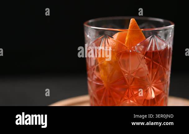 Old Fashioned Cocktail Rotating on black background. Copy space Stock ...