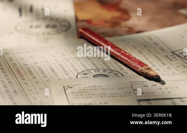 Papers with vintage Japanese secret hieroglyphic texts on a general ...