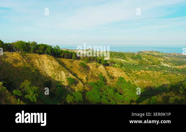 Calabrian landscape with trees and hills near the Mediterranean Sea ...