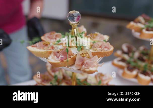Professional preparation of delicious crostini snacks for a luxury ...