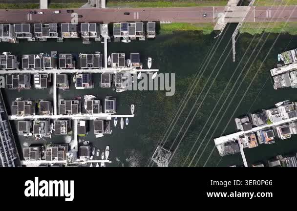 Aerial top down perspective showing a modern sustainable floating house ...