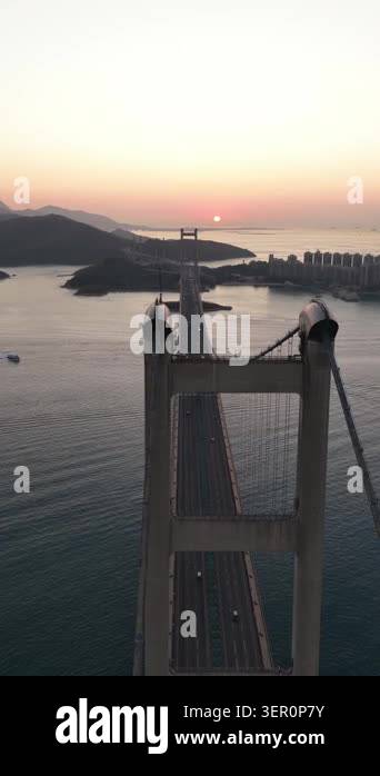Majestic aerial view tracking away from the iconic tsing ma bridge in ...