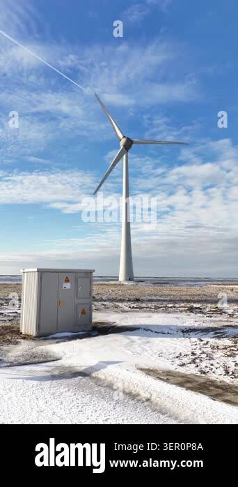 Single modern wind turbine generating clean, renewable energy in a ...