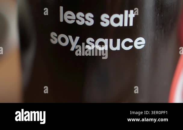 A bottle of less salt soy sauce useful for cooking Stock Video Footage ...