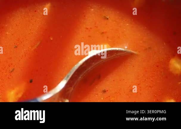 Watch as the chef prepares a tasty tomato soup using common items Stock ...