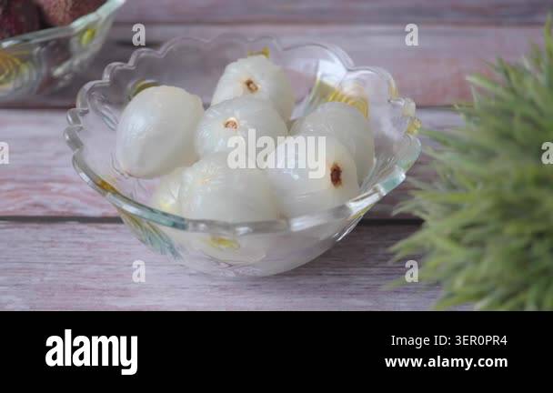 Fresh Peeled Lychee Fruits in a Glass Bowl Stock Video Footage - Alamy