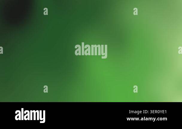 Abstract background with soft green bokeh and subtle light leaks ...
