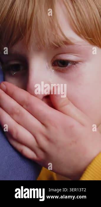 Close-up portrait of upset child little girl kid crying with tears ...