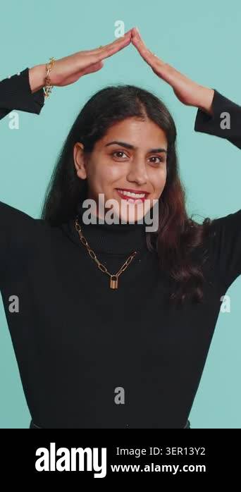 Young Indian woman playing childish catching up game, feeling in safe ...