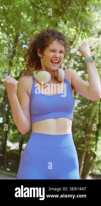 Athletic fit runner girl celebrate success win scream rejoices triumph ...