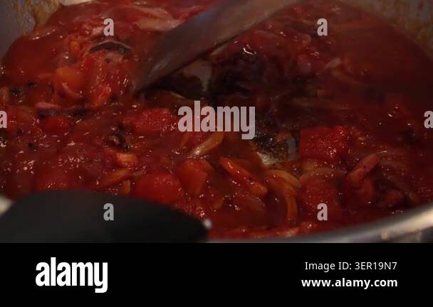 A mixture of bacon bits, onions and tomatoes close-up cinematic view ...